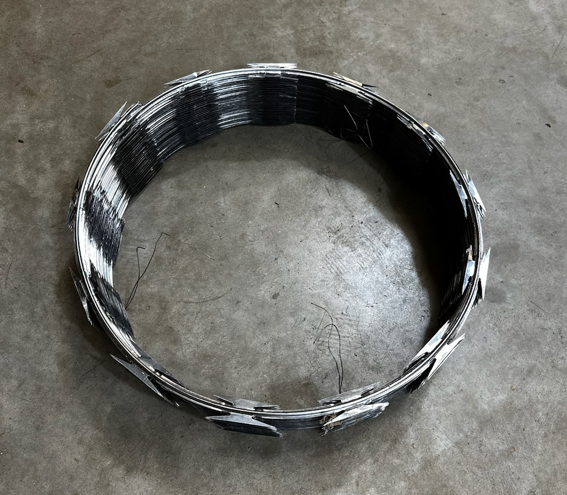 American Fence & Supply Co.: ECONOMY RAZOR WIRE 18"x50' 430stainless